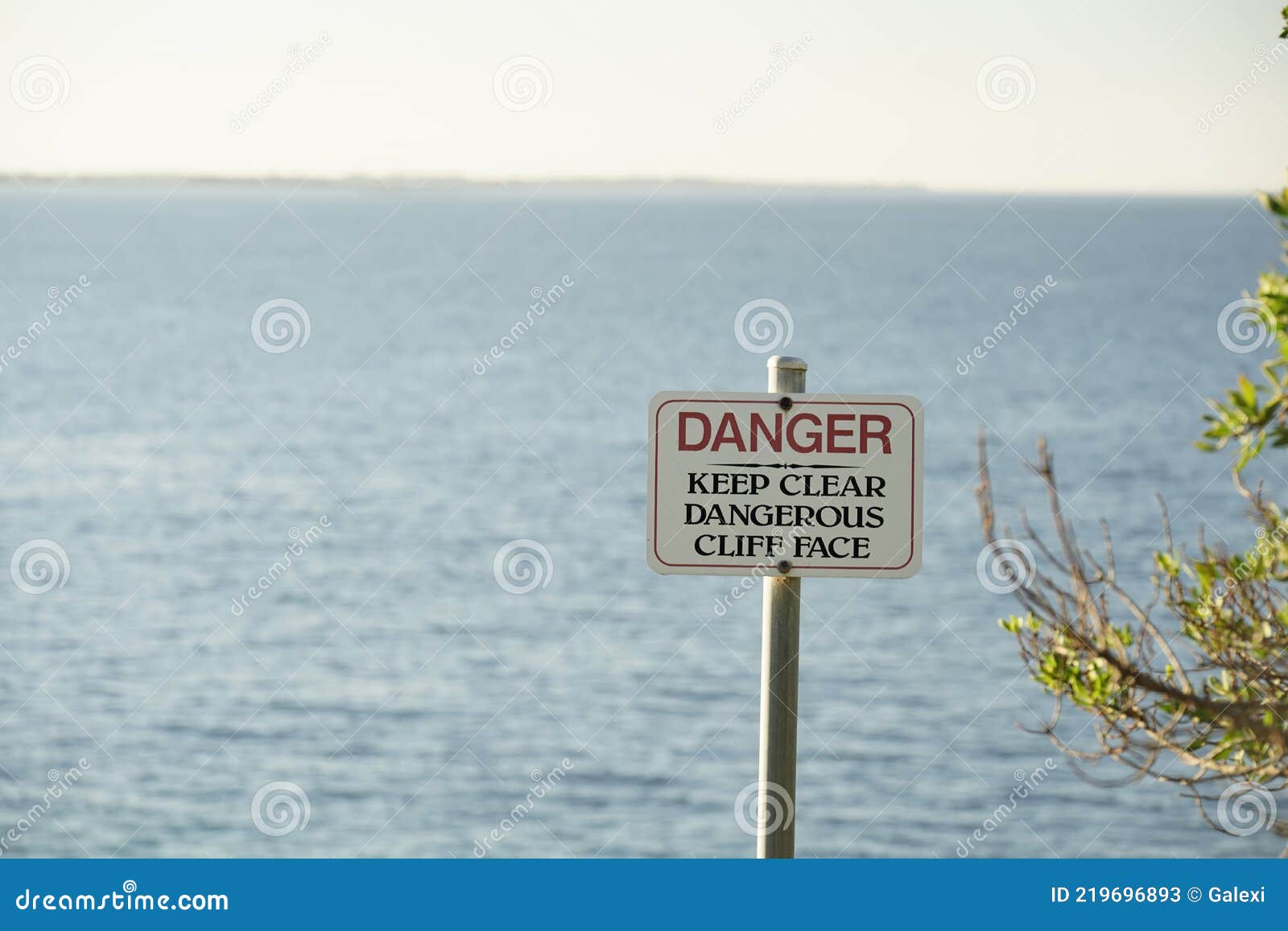 Danger Sign with Sea in Background Stock Image - Image of roadside ...
