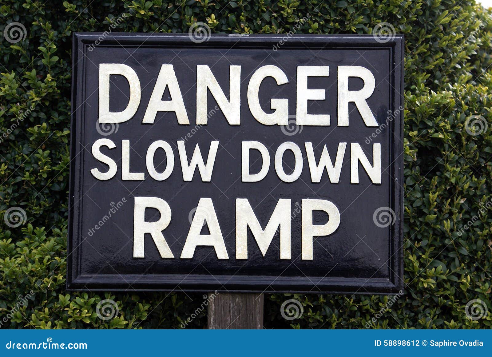 Danger slow down ramp sign stock photo. Image of road - 58898612