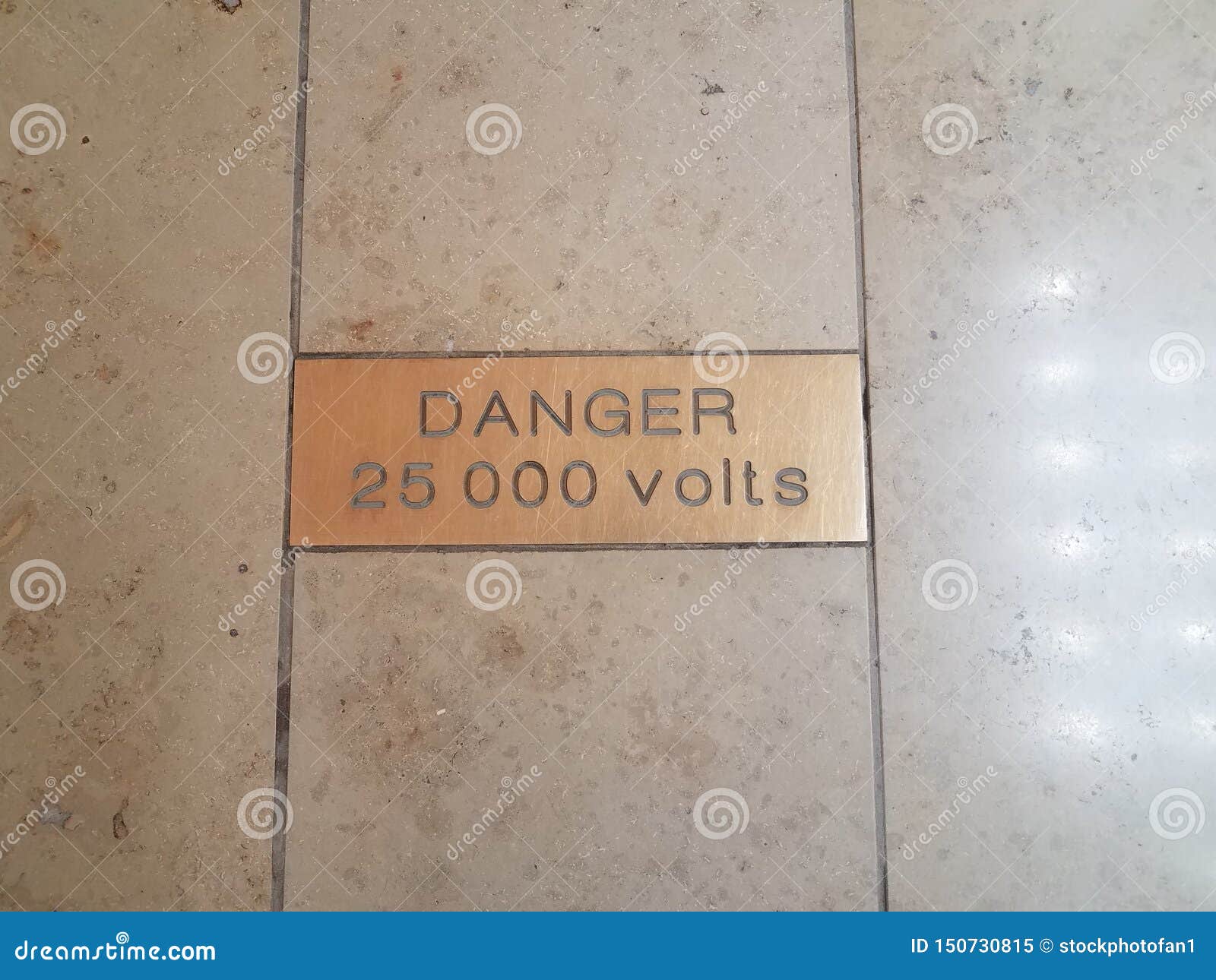 Danger 25000 Volts Warning Sign On Tile Floor Royalty-Free Stock Photo ...