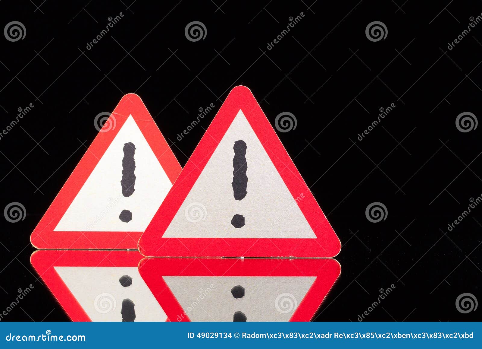 Danger Warning Signs on the Black Glass Desk Stock Photo - Image of ...