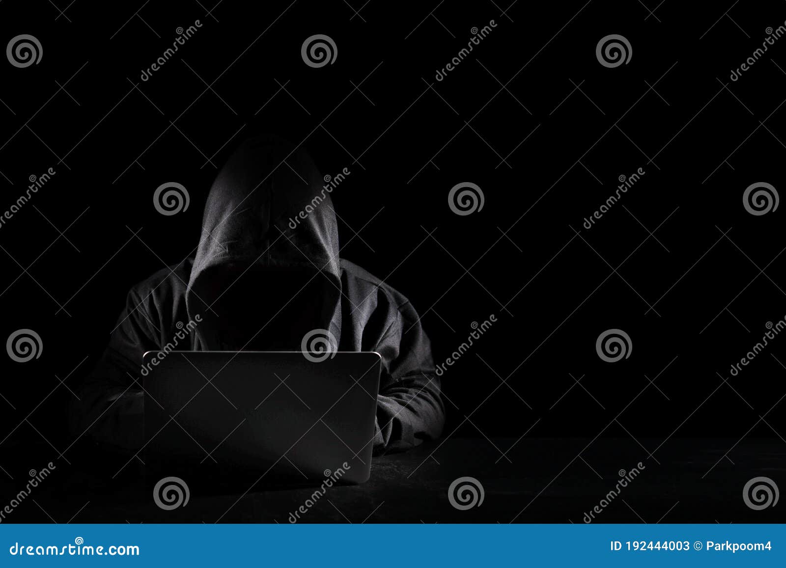 Dangerous Anonymous Hacker Man in Black Hooded Using Computer, Breaking ...