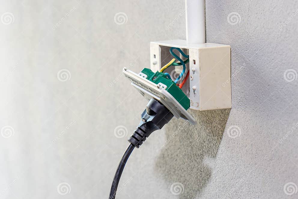 Dangerous Broken Electrical Socket Falling Out of Wall Stock Photo ...