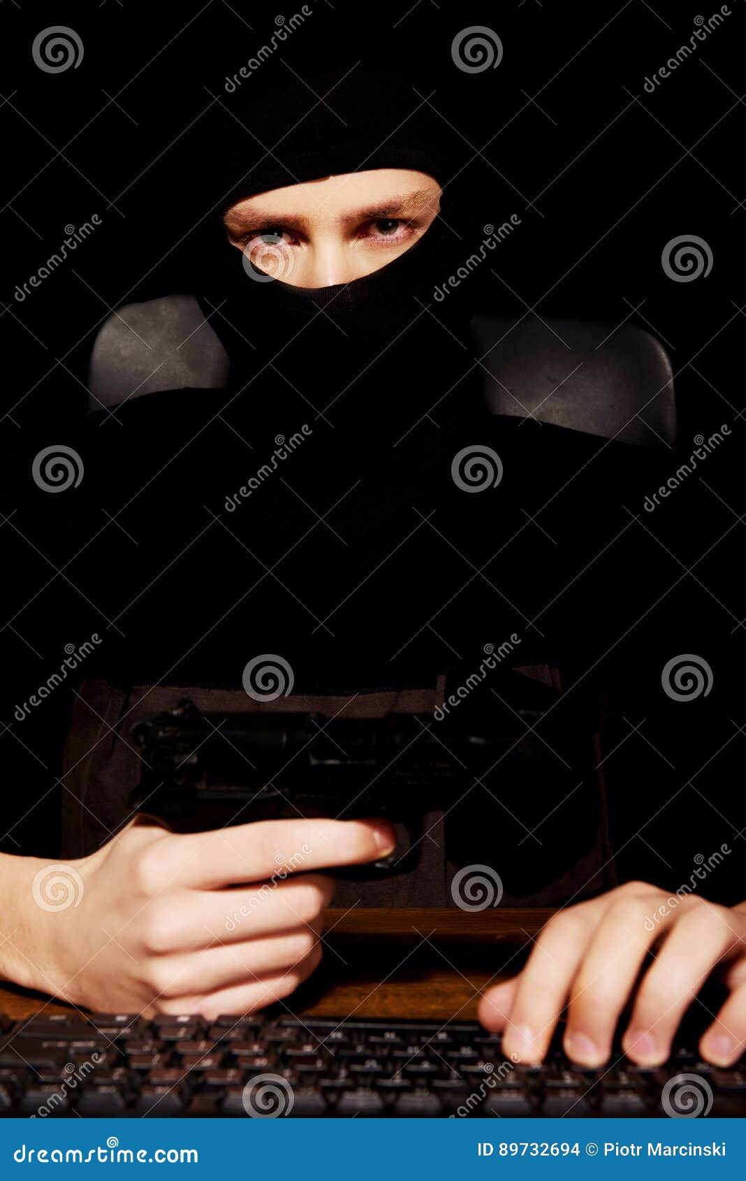 Dangerous Hacker in Balaclava Holding Gun Stock Photo - Image of ...