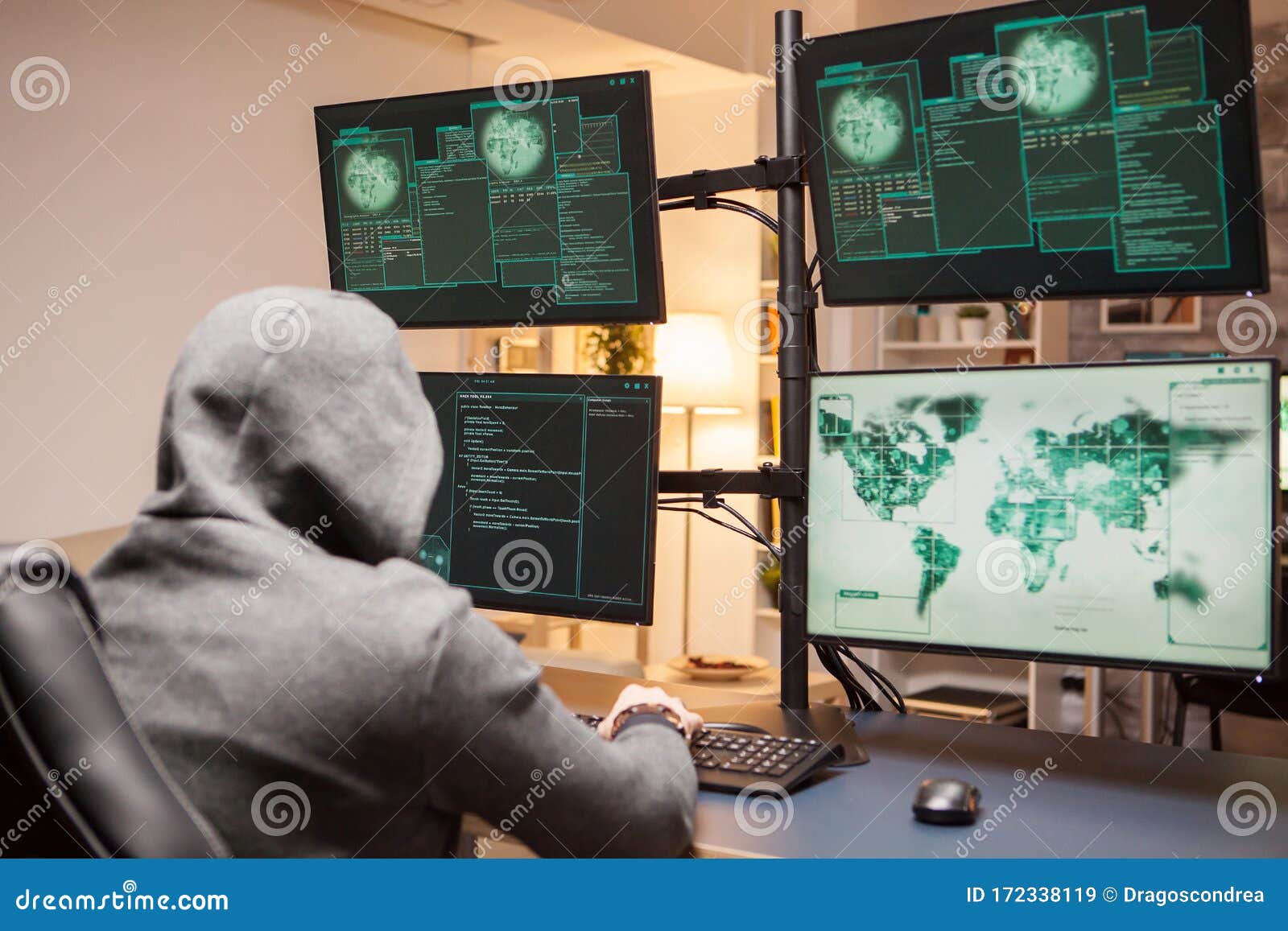 Dangerous Hacker Wearing a Hoodie while Planting a Malware Stock Image ...