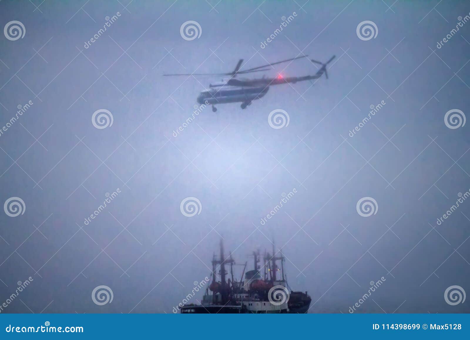 Helicopter Performs Loading Operations on Icebreake in Fog Stock Image ...