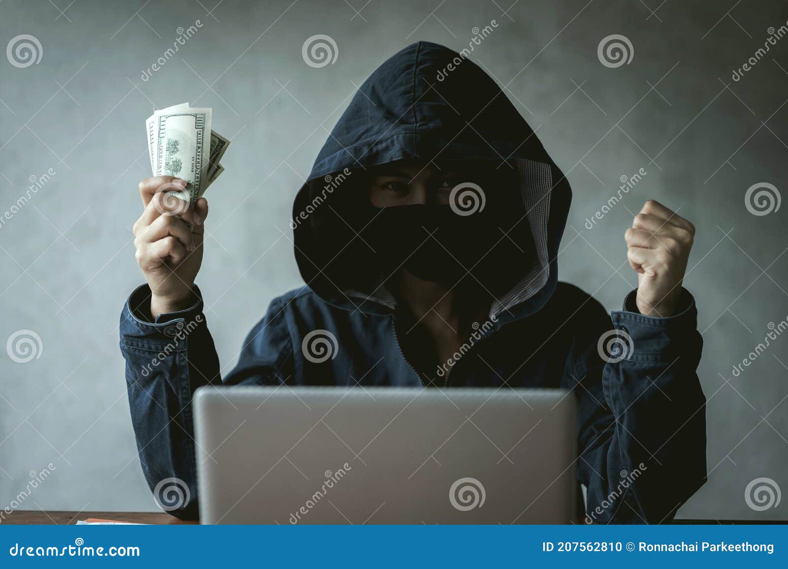 Dangerous Hooded Hacker Held the Money after Successfully Hacking Stock ... Dangerous Hooded Hacker Held the Money after Successfully Hacking Stock ...