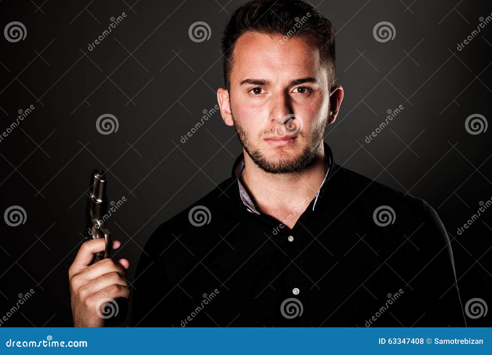 Dangerous man with a gun stock photo. Image of isolated - 63347408