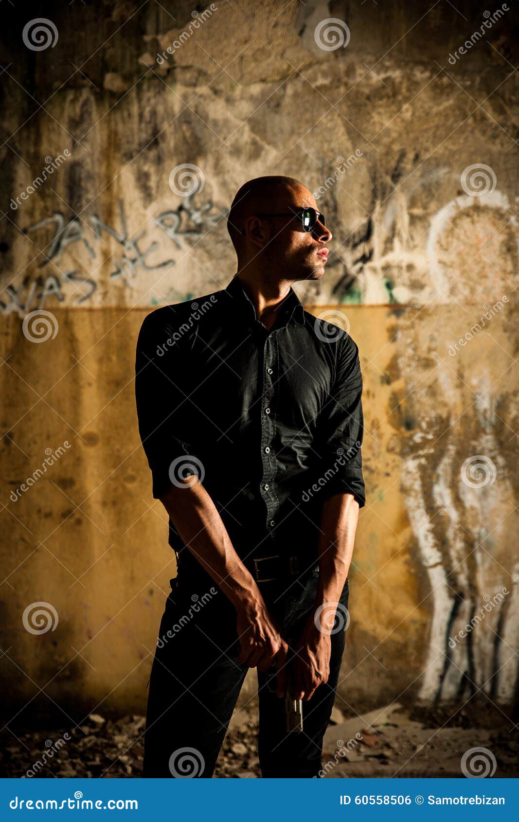 Dangerous man with a gun stock photo. Image of house - 60558506