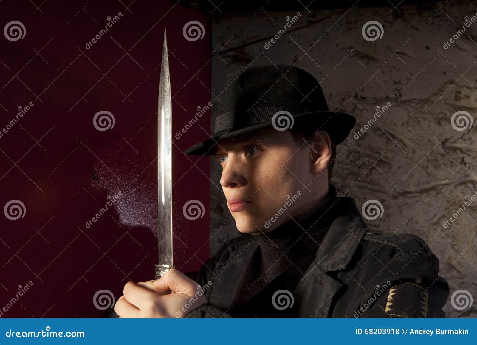 A Dangerous Man Holding Dagger Stock Photo - Image of bandit, attack ...