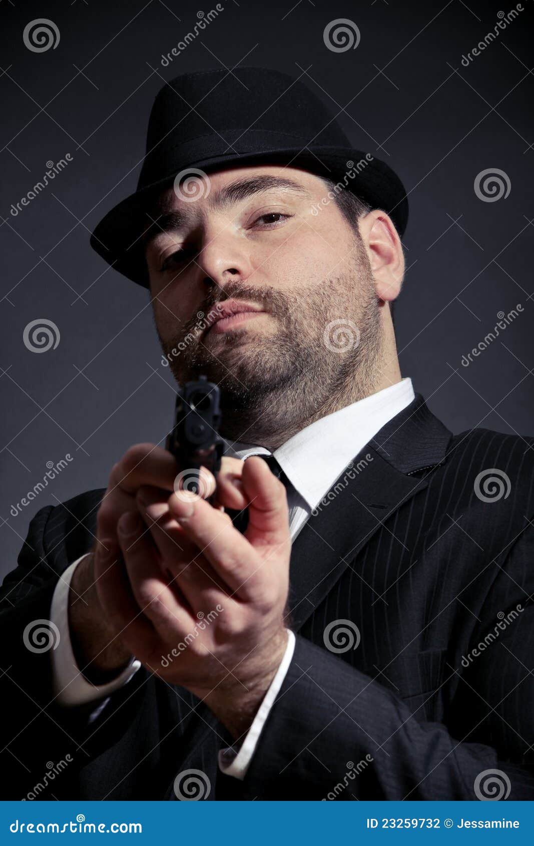 Stock photo guy pointing gun at camera - boysfert