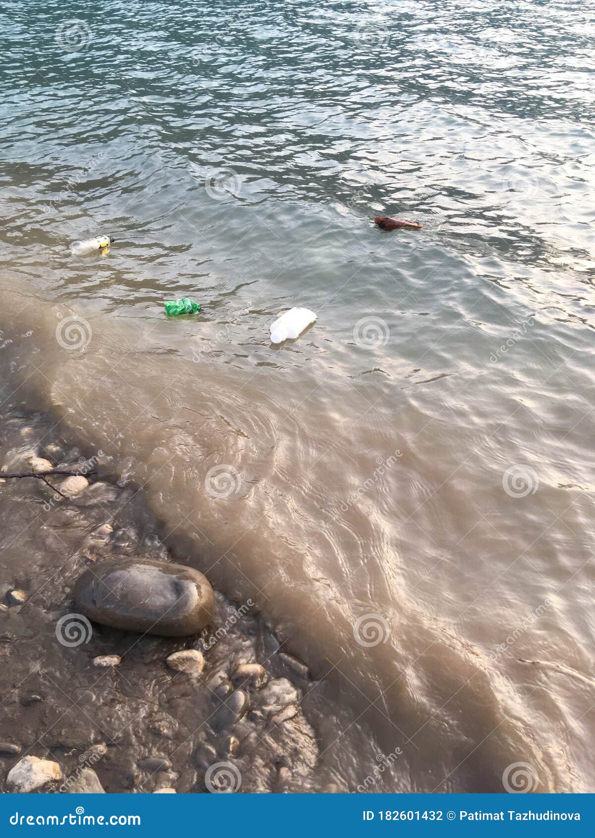 Dangerous Rubbish on a Stony Beach. Photo Showing Pollution Problem ...