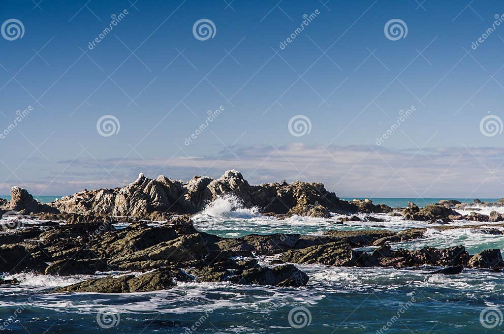 Dangerous sharp sea rocks stock image. Image of rocks - 43701207