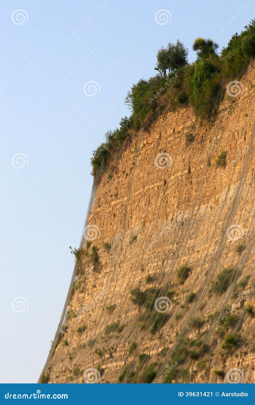 Dangerous And Steep High Sheer Cliff With Burrows Of Birds Royalty-Free ...