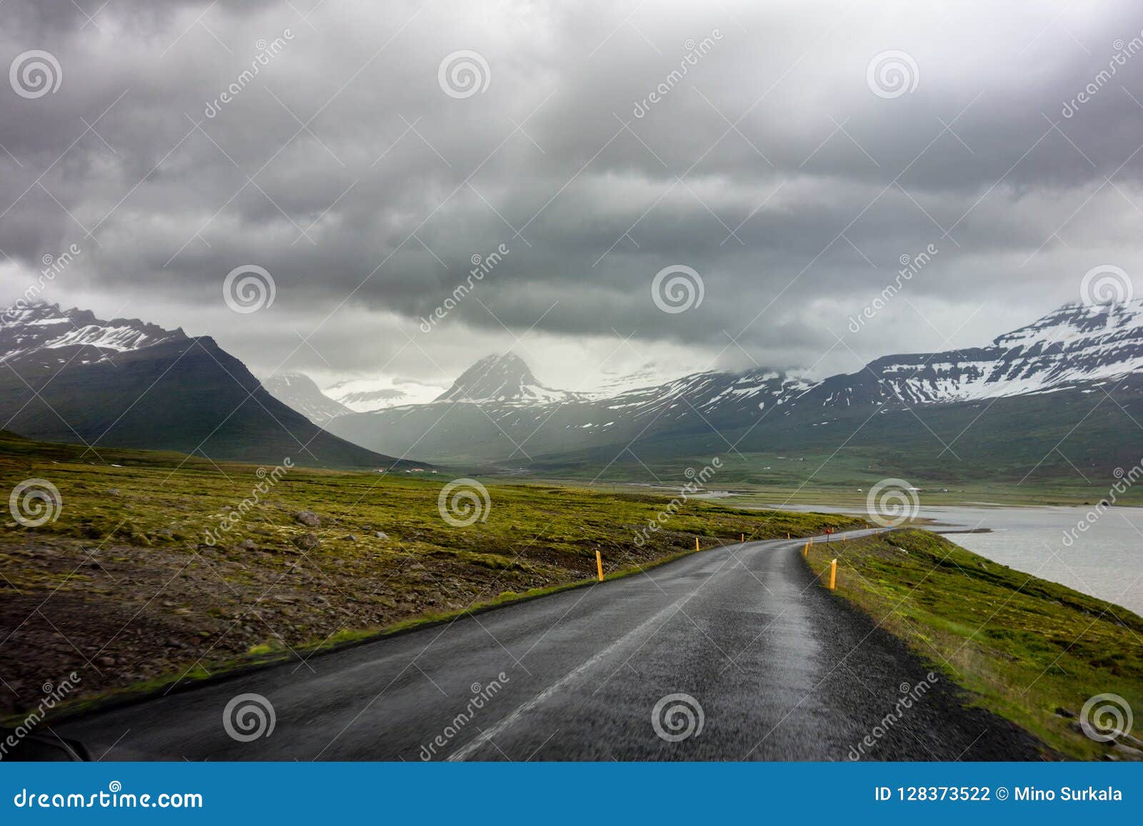 Dangerous Winding Downhill Road With Warning Signs In Iceland With A ...