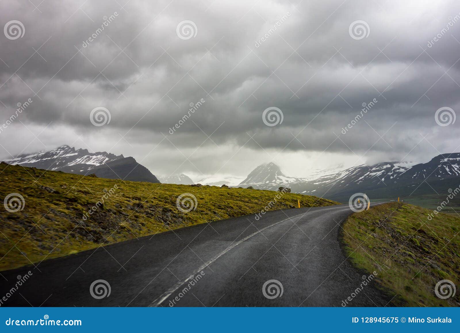 Dangerous Winding Downhill Road With Warning Signs In Iceland With A ...