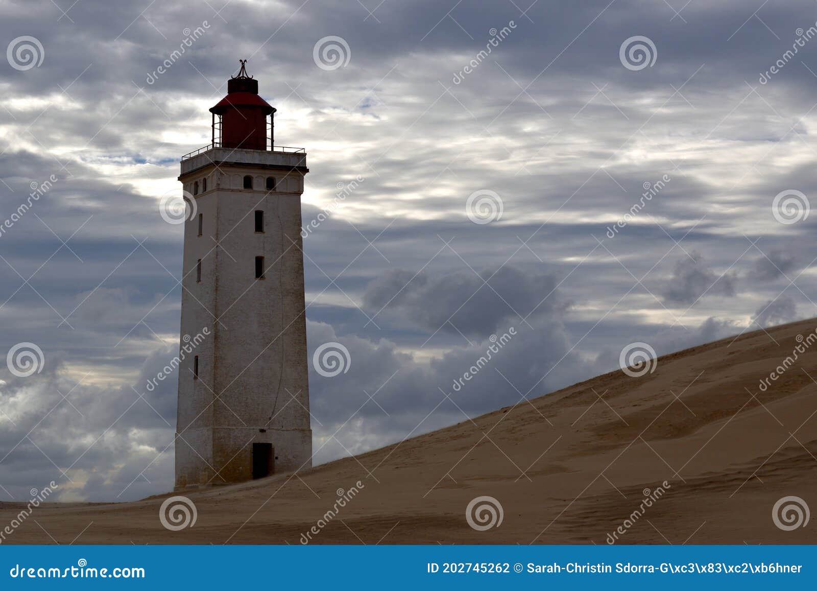 Danish Lighthouse on Hiking Dune and Dramatic Cloud Formations in the ...