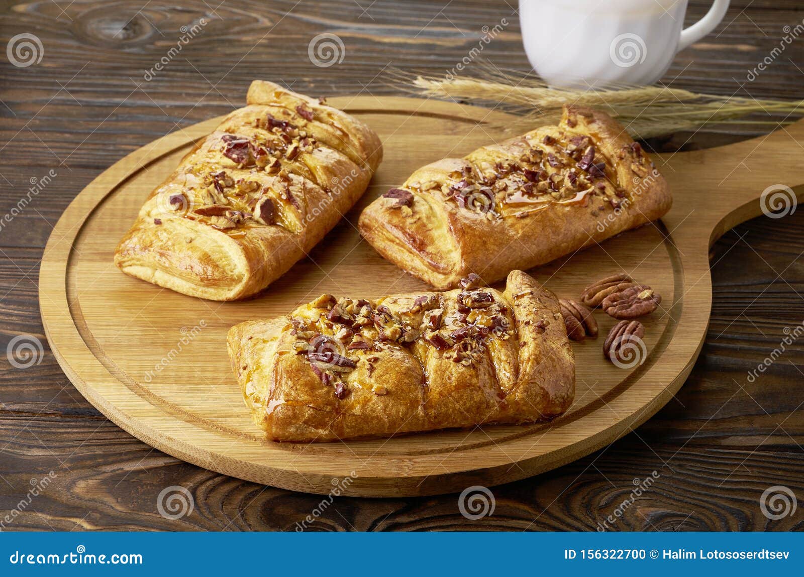 Danish Pastry Maple Pecans with Nuts and Maple Syrup on Wooden Table ...