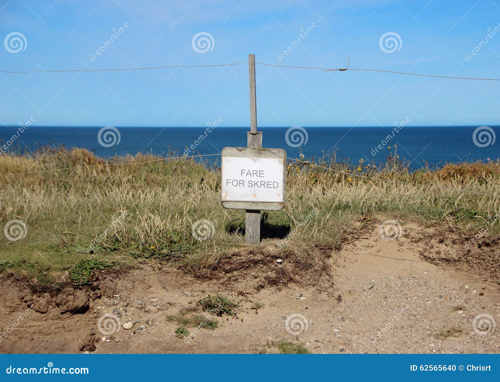 Danish Sign at Edge of Cliff Warning of Erosion Stock Photo - Image of ...