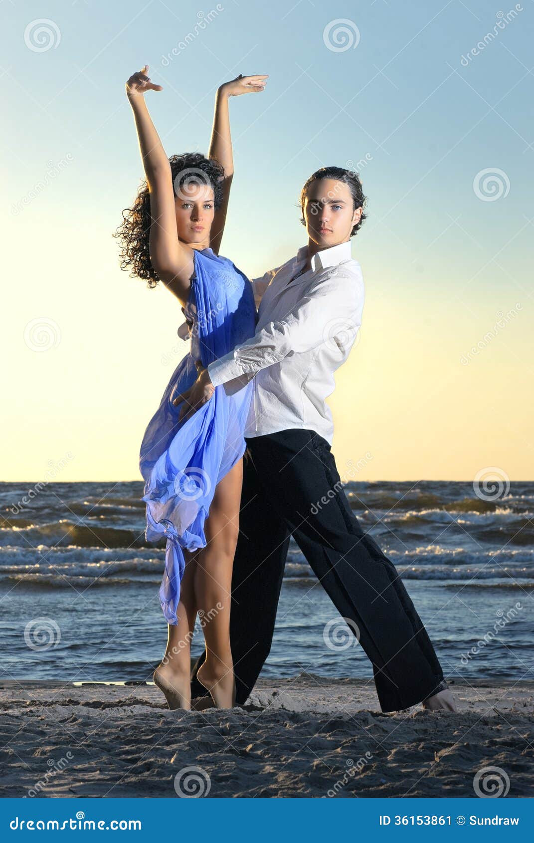 Dansing on the beach stock image. Image of evening, people - 36153861