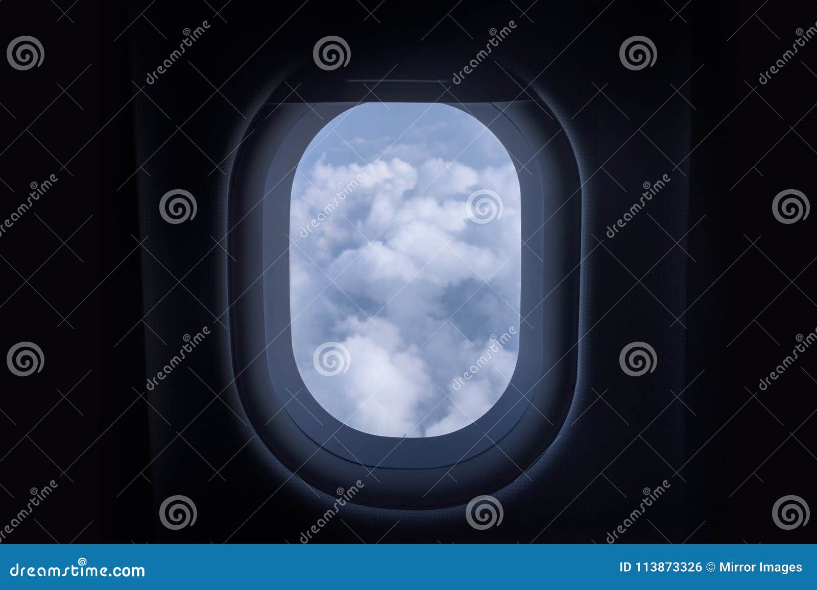 Dark Airplane Interior Looking Out the Window of Bright Day Blue Stock ...