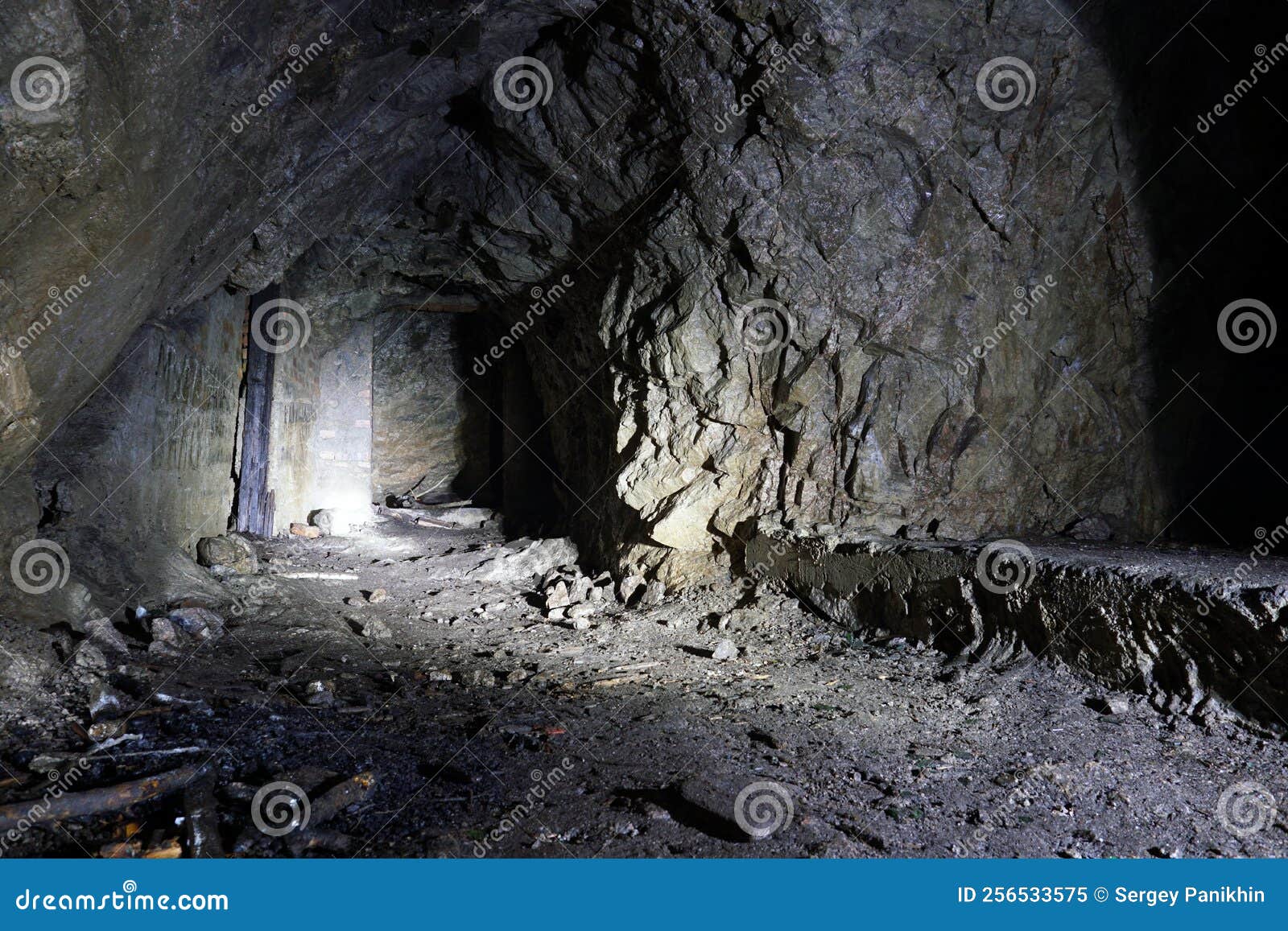 A Dark Artificial Stone Cave in the Mountains. Stock Image - Image of ...