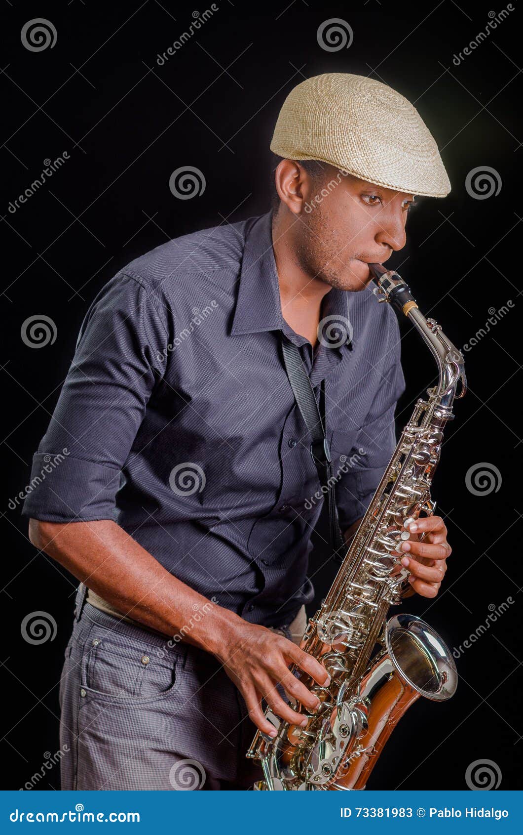 In a Dark Background Man Playing His Saxophone, Passion Music Stock ...