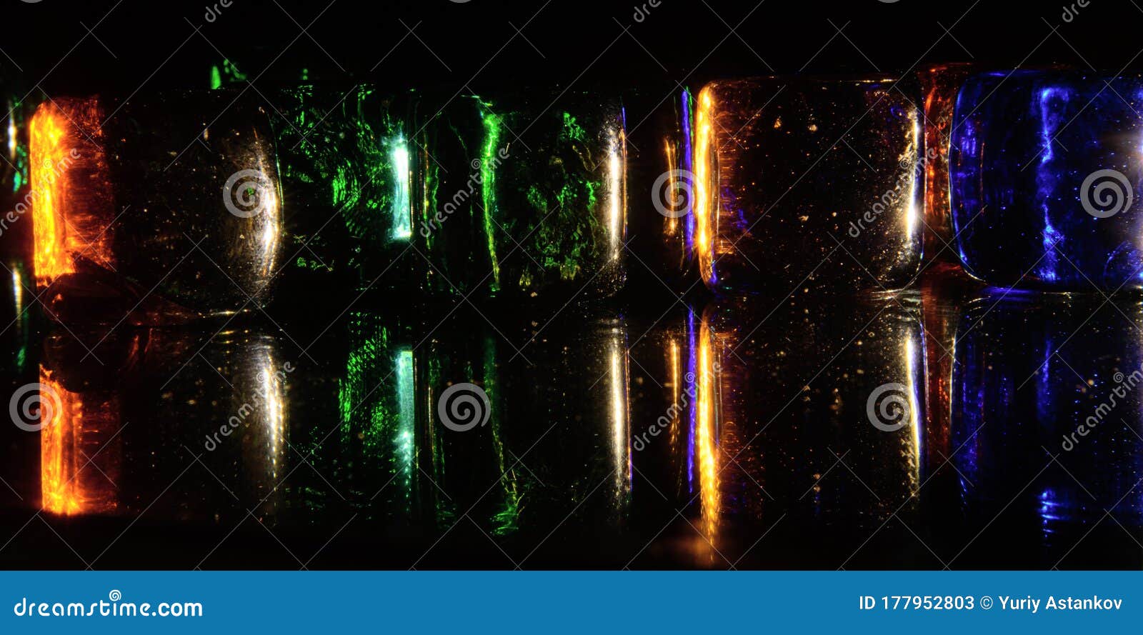 On a Dark Background Multi-colored Reflections from Colored Crystals ...