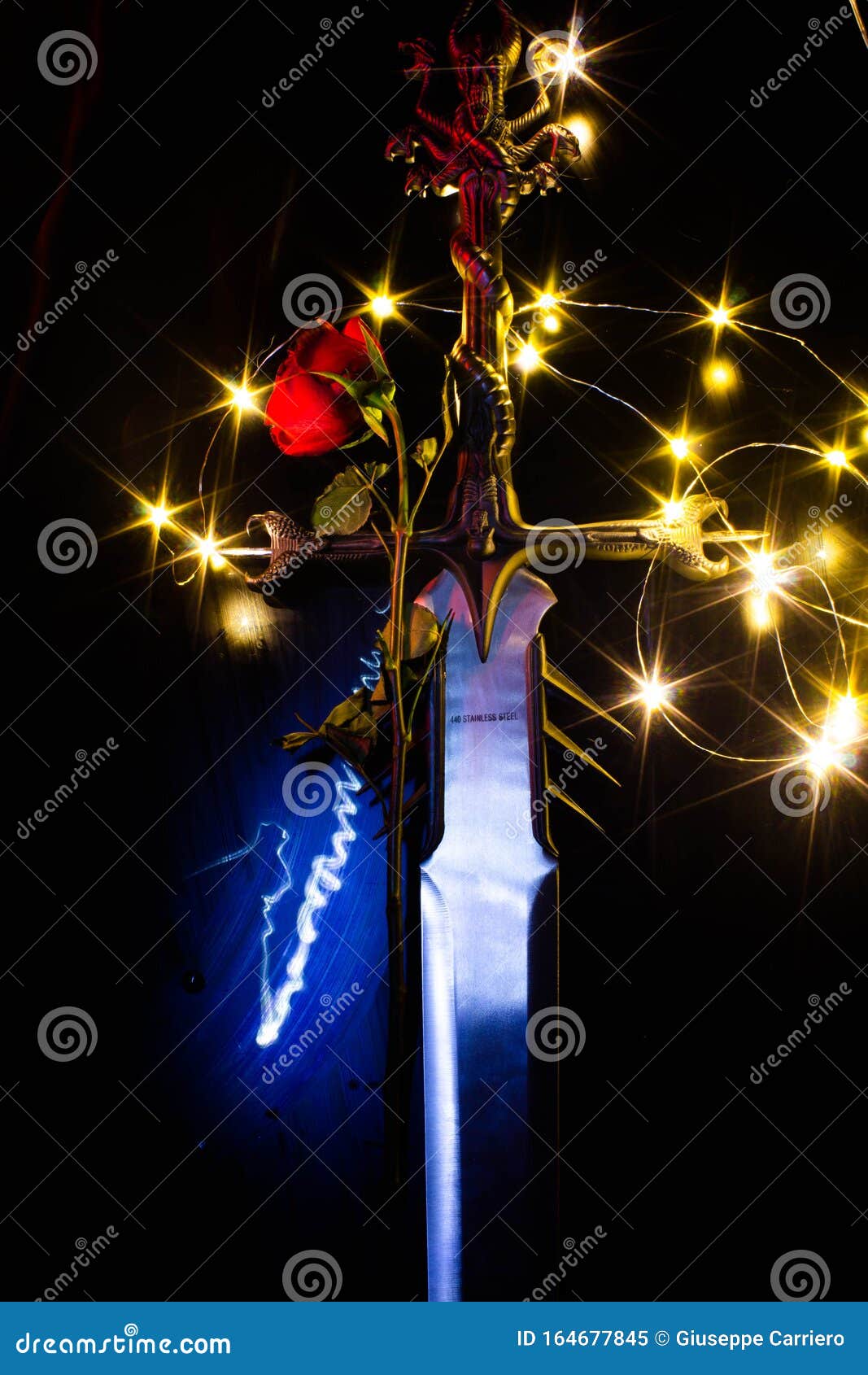 Sword And Rose Stock Photo | CartoonDealer.com #33728928