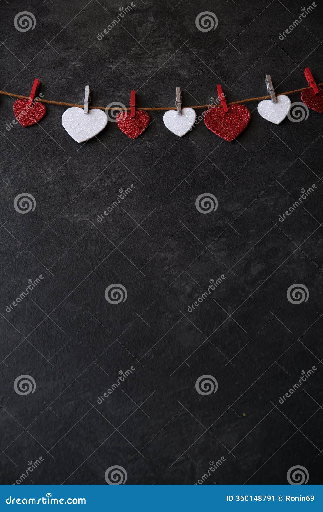 On a Dark Background on a String of Hearts Stock Image - Image of ...