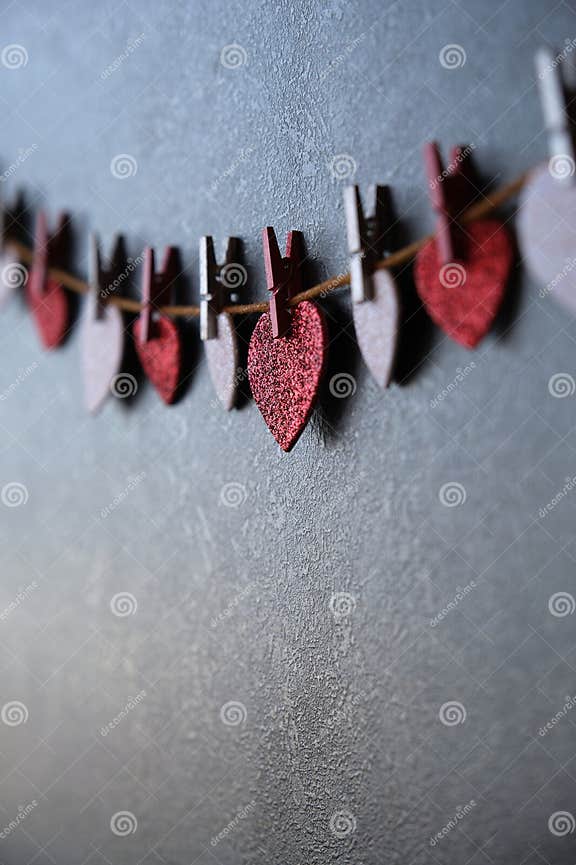 On a Dark Background on a String of Hearts Stock Image - Image of style ...