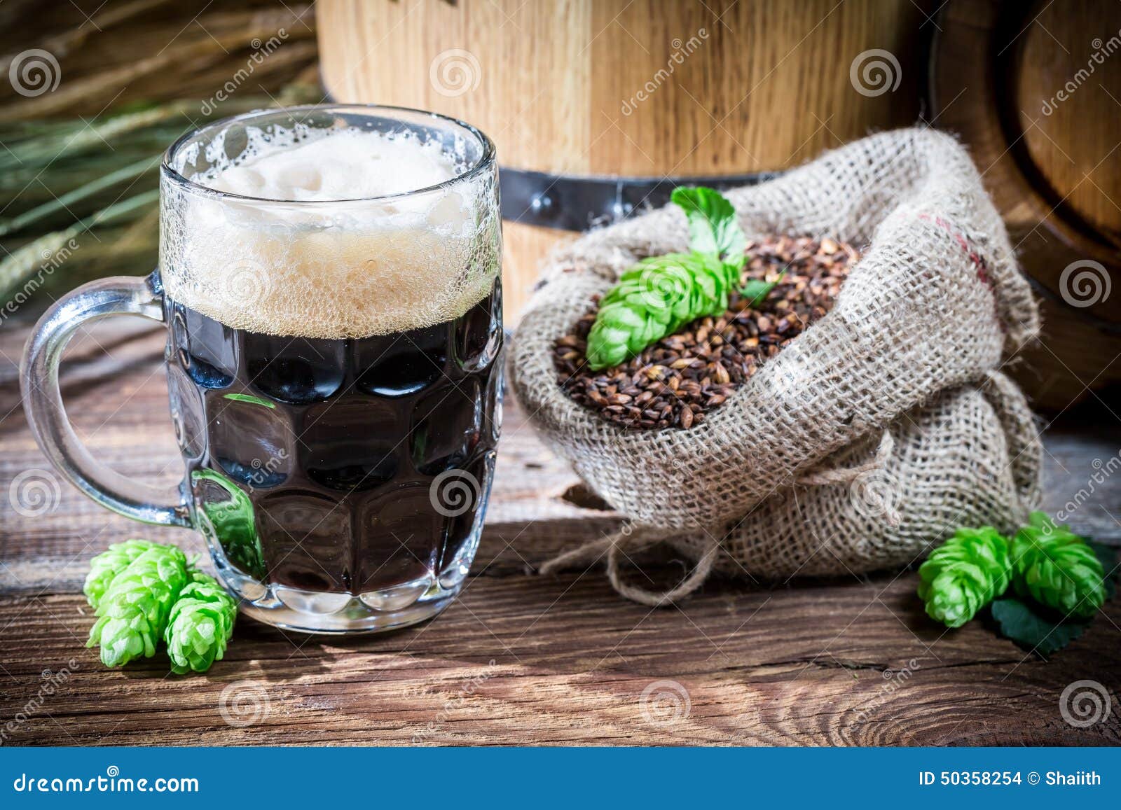 Dark Beer Made of Malt Caramel Stock Photo - Image of yellow, wooden ...