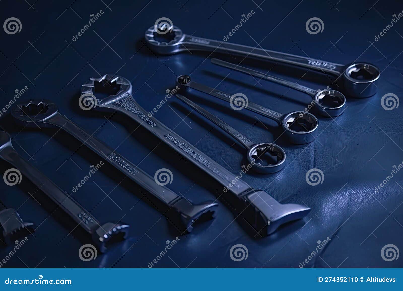 Dark Blue Backdrop with Metal Object, Such As Wrench or Socket Set ...
