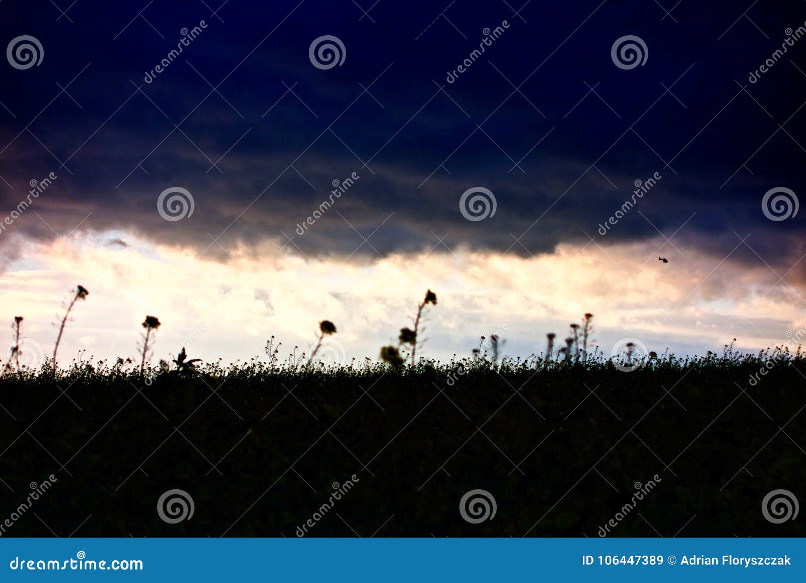 Dark Blue Brooding Sky after a Storm with a Helicopter in the Clouds ...