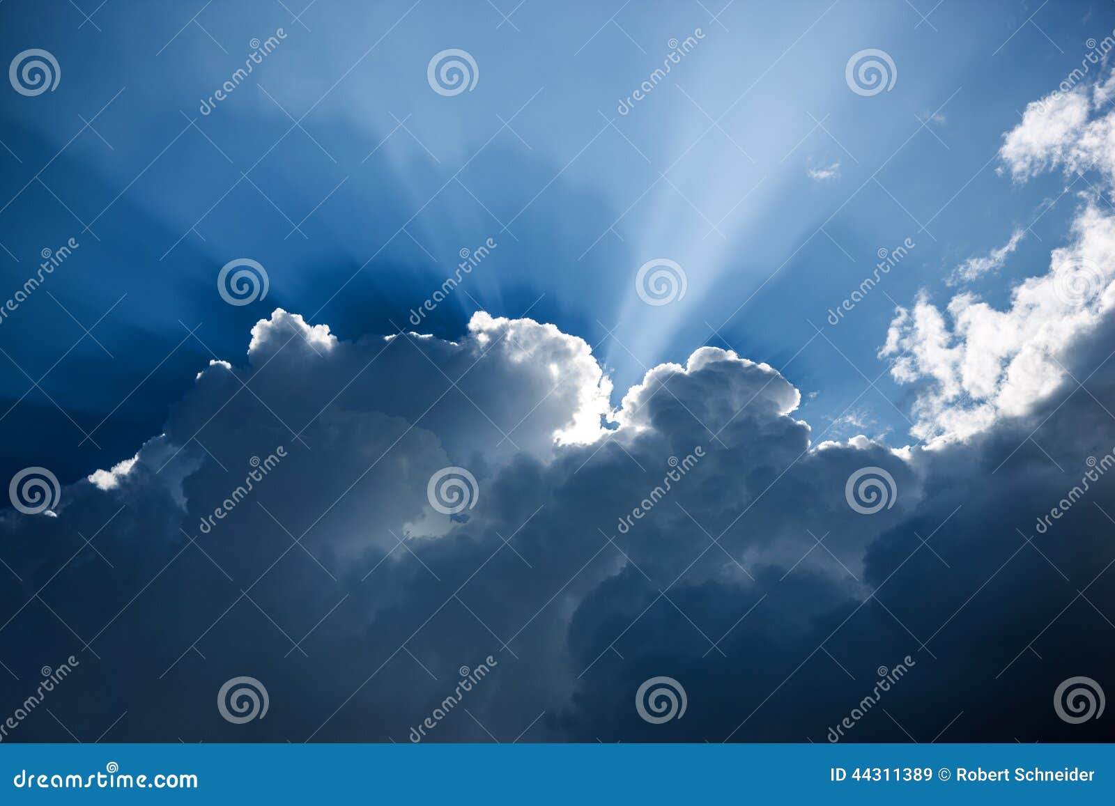 Dark Blue Cloud Formation with Sunbeams Stock Image - Image of sunray ...