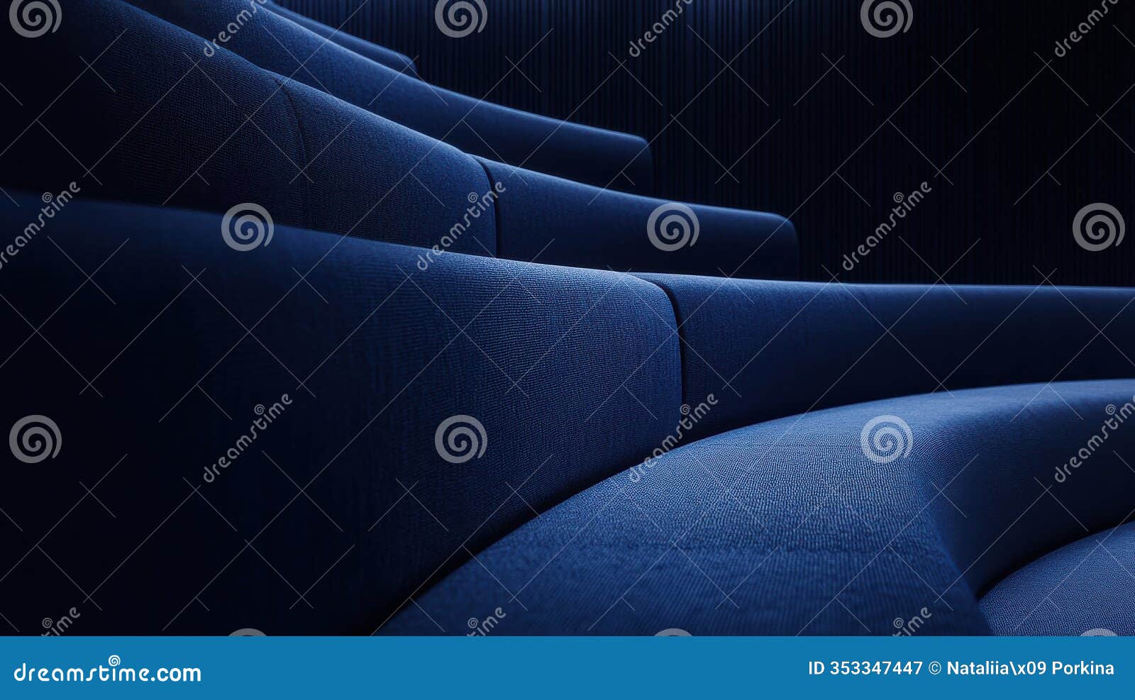 Dark Blue Curved Seating in a Modern Auditorium with Minimal Lighting ...