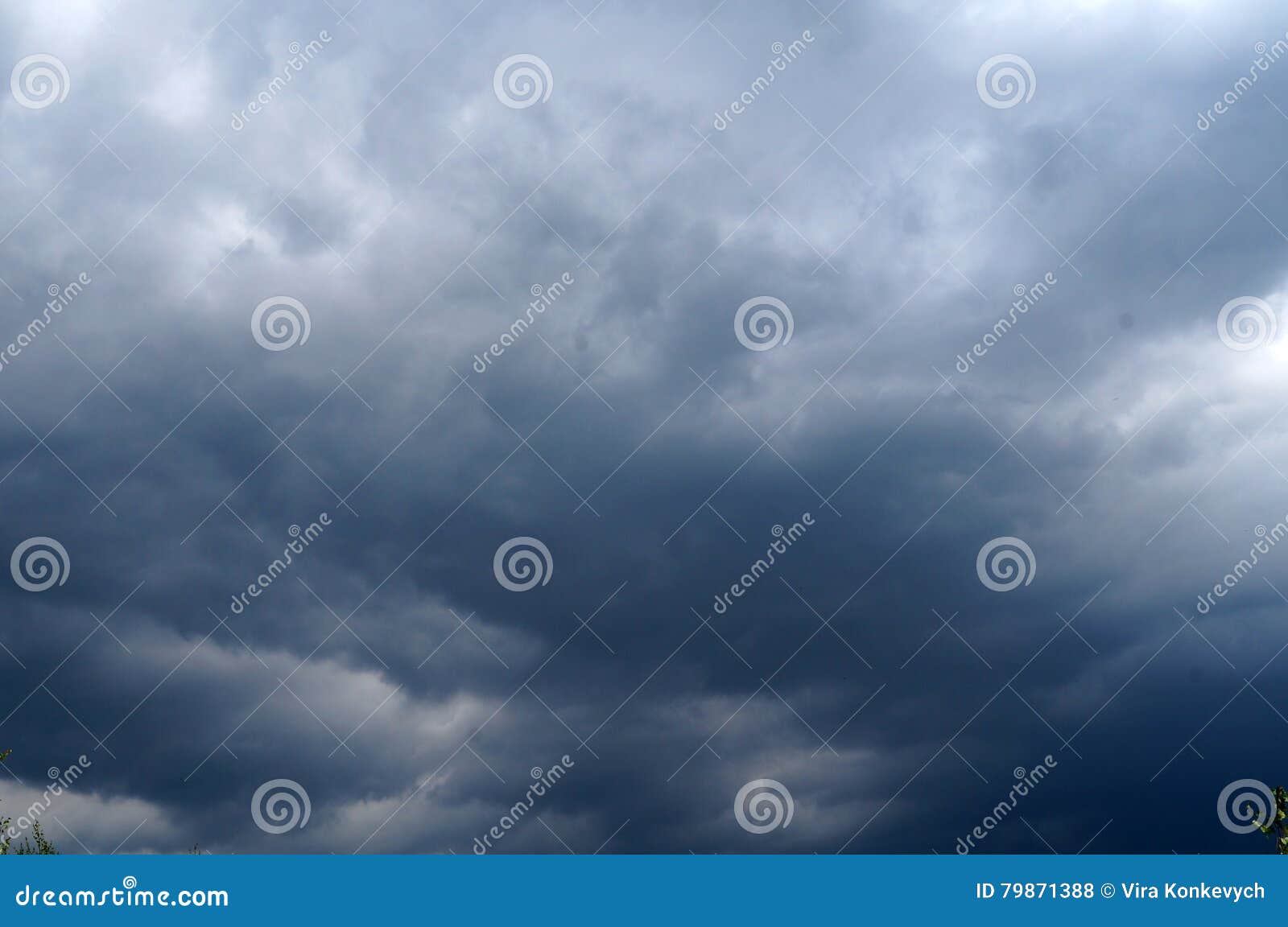Dark Blue Rain Clouds with White Gleams in the Sky Stock Photo - Image ...