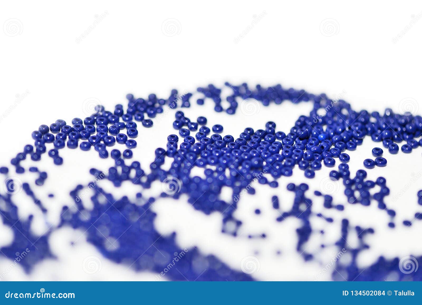 Dark Blue Seed Beads Scattered on a White Surface Stock Photo - Image ...