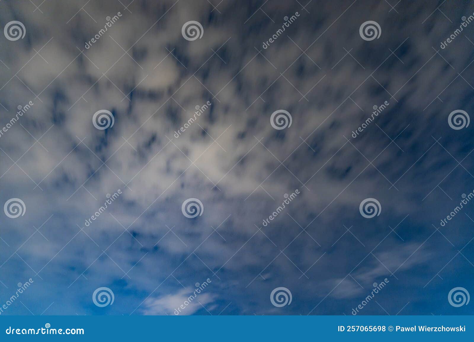 Dark Blue Sky on Long Exposure with Moving Clouds at Night Stock Photo ...