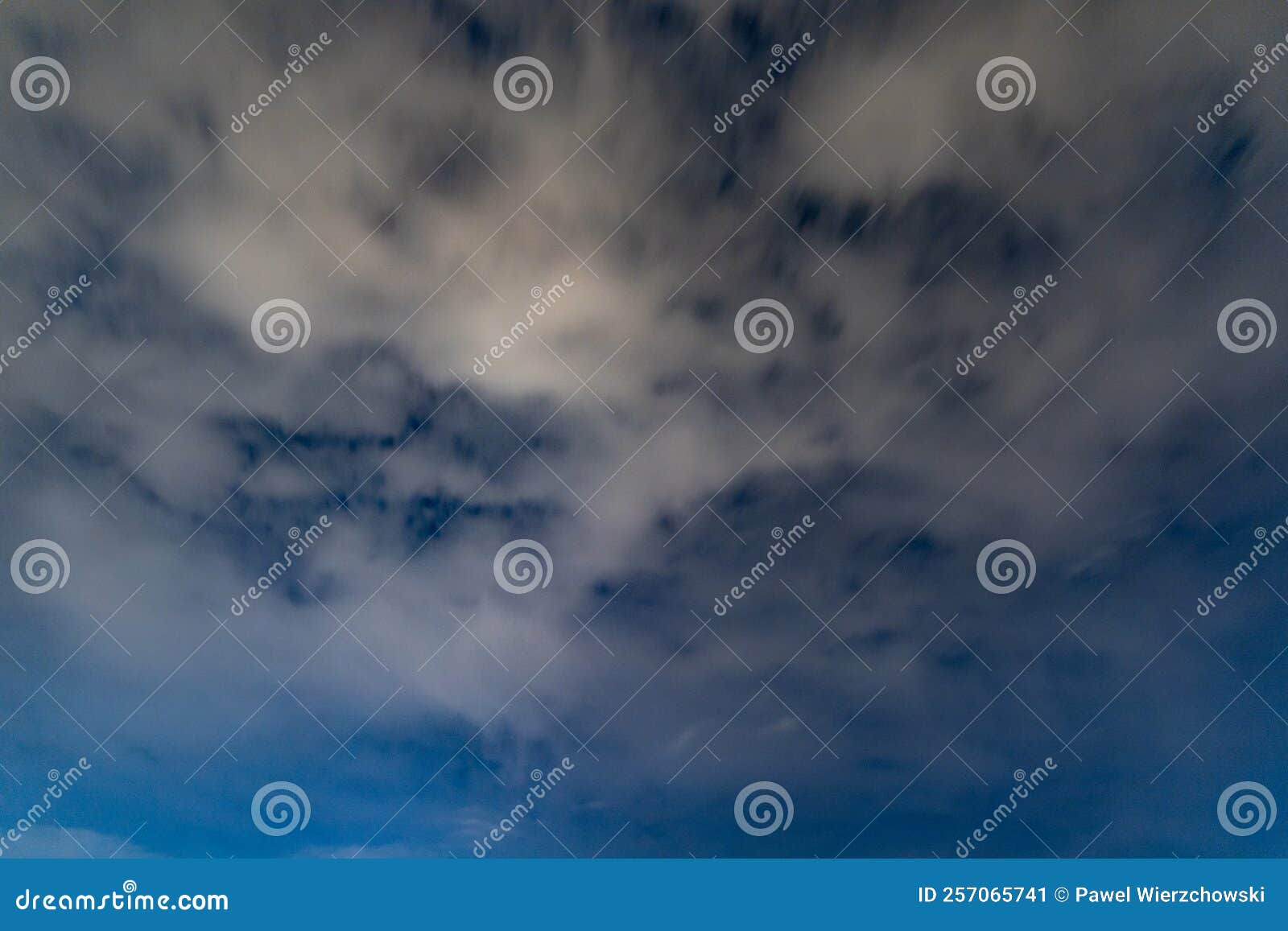 Dark Blue Sky on Long Exposure with Moving Clouds at Night Stock Image ...
