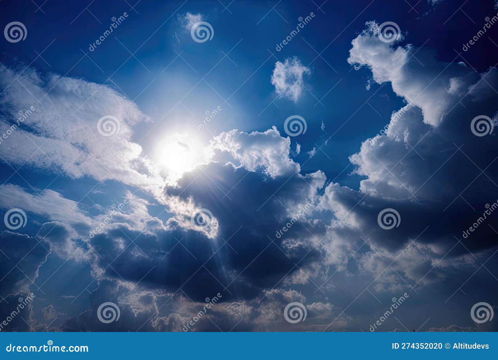 Dark Blue Sky with Wispy Clouds and Sun Shining through in the ...