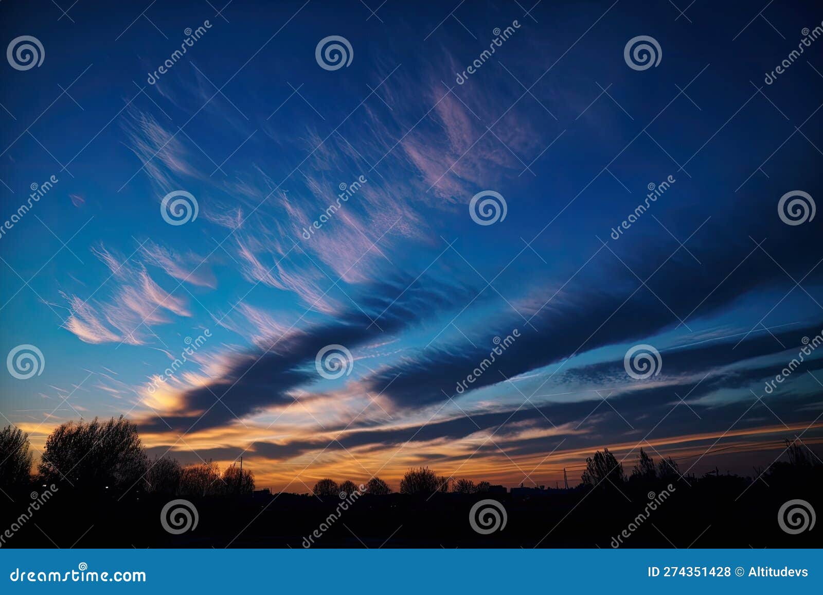 A Dark Blue Sky with Wispy Clouds at Sunset Stock Photo - Image of ...