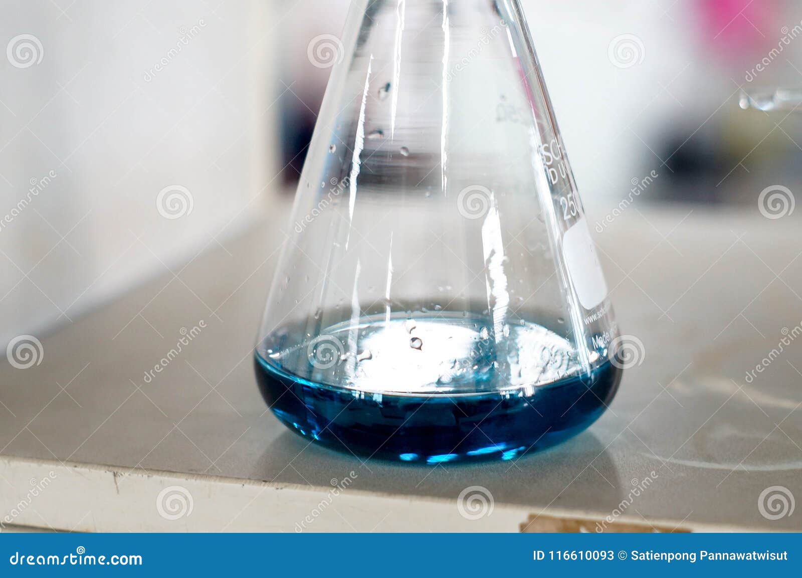 Blue solution in flask stock image. Image of medical - 116610093