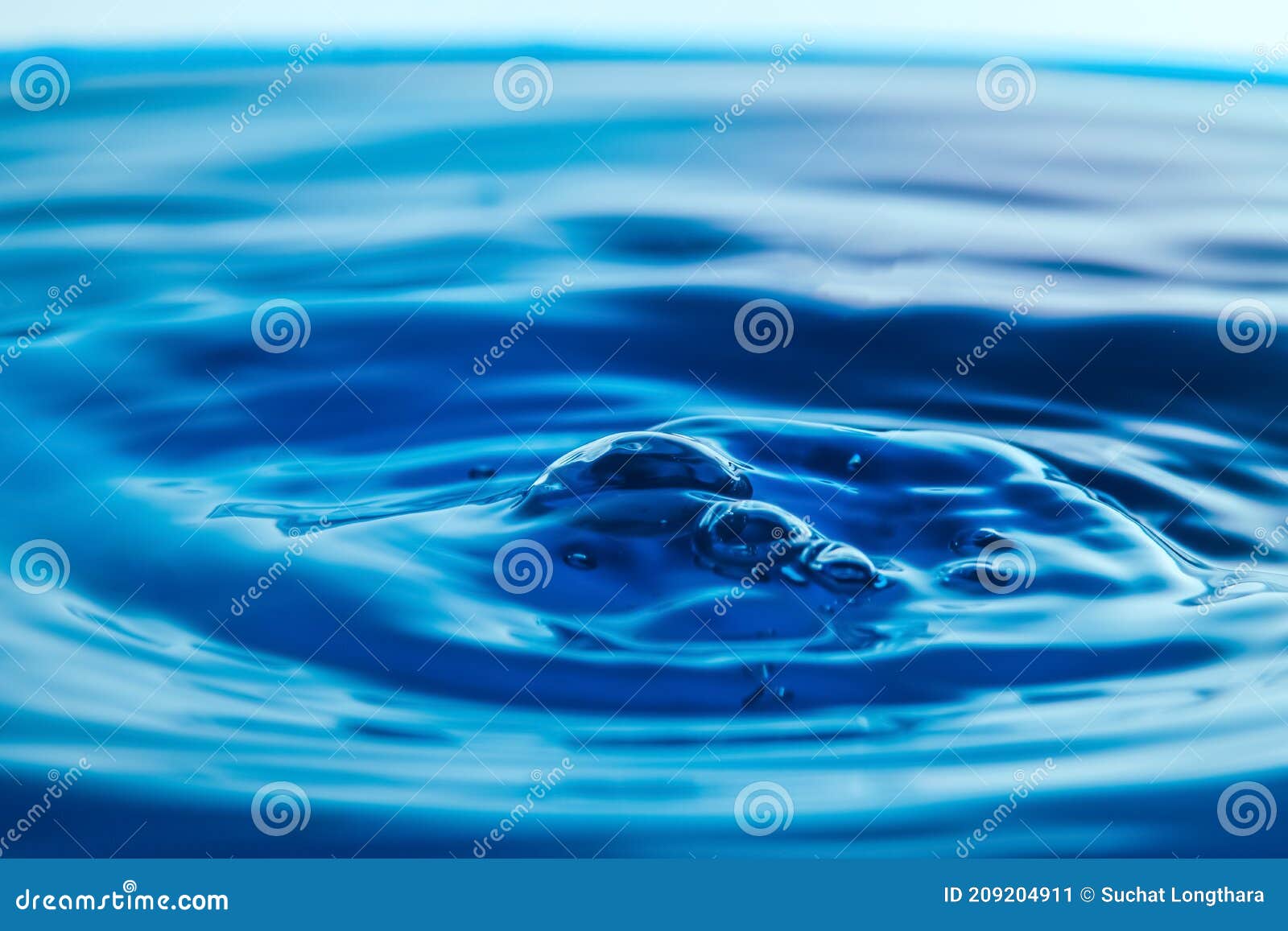 Dark Blue Water Droplets Splash Close Up on the Water Surface Stock ...