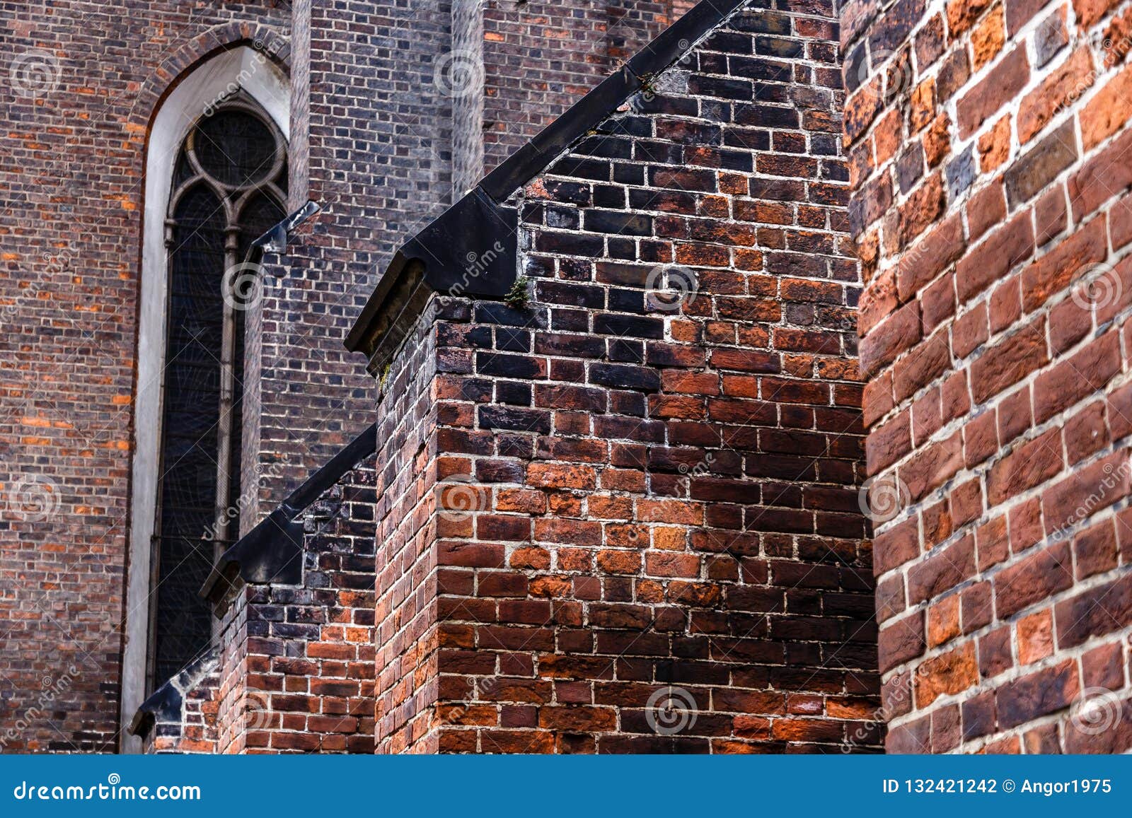 Dark Brick Wall of an Old Catholic Cathedral Stock Photo - Image of ...