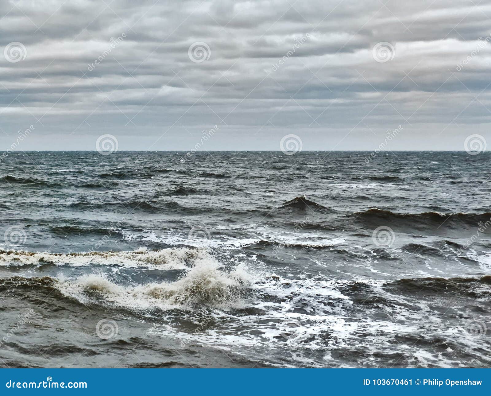 Dark Brooding Seascape with Stormy Waves and Grey Clouds Stock Image ...