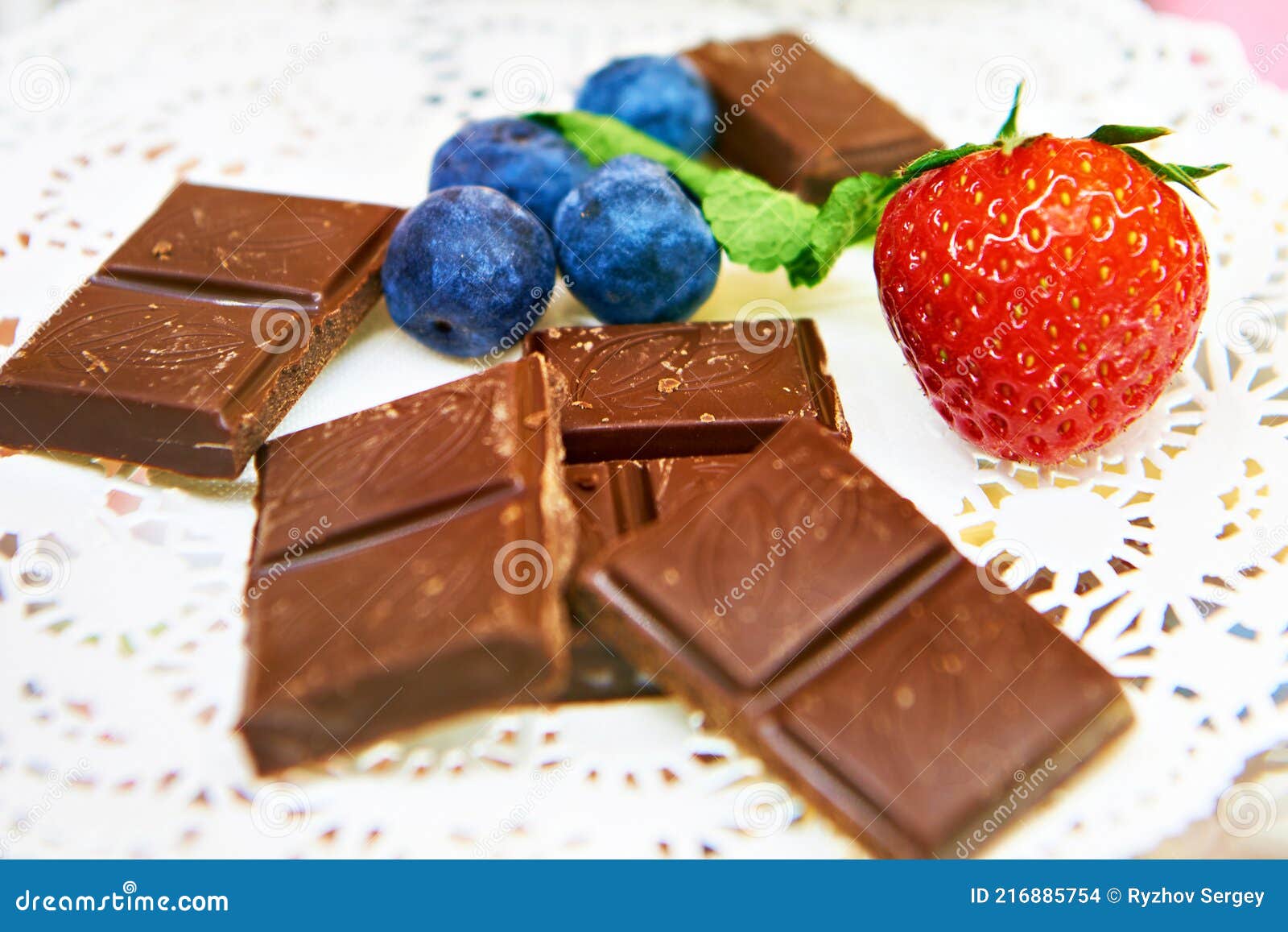 Dark chocolate and berries stock photo. Image of blueberry - 216885754
