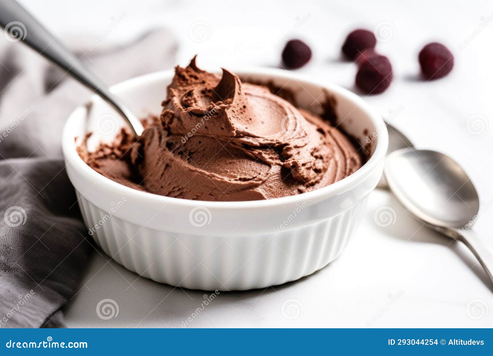 Dark Chocolate Mousse in a White Bowl with a Silver Spoon Stock Photo ...