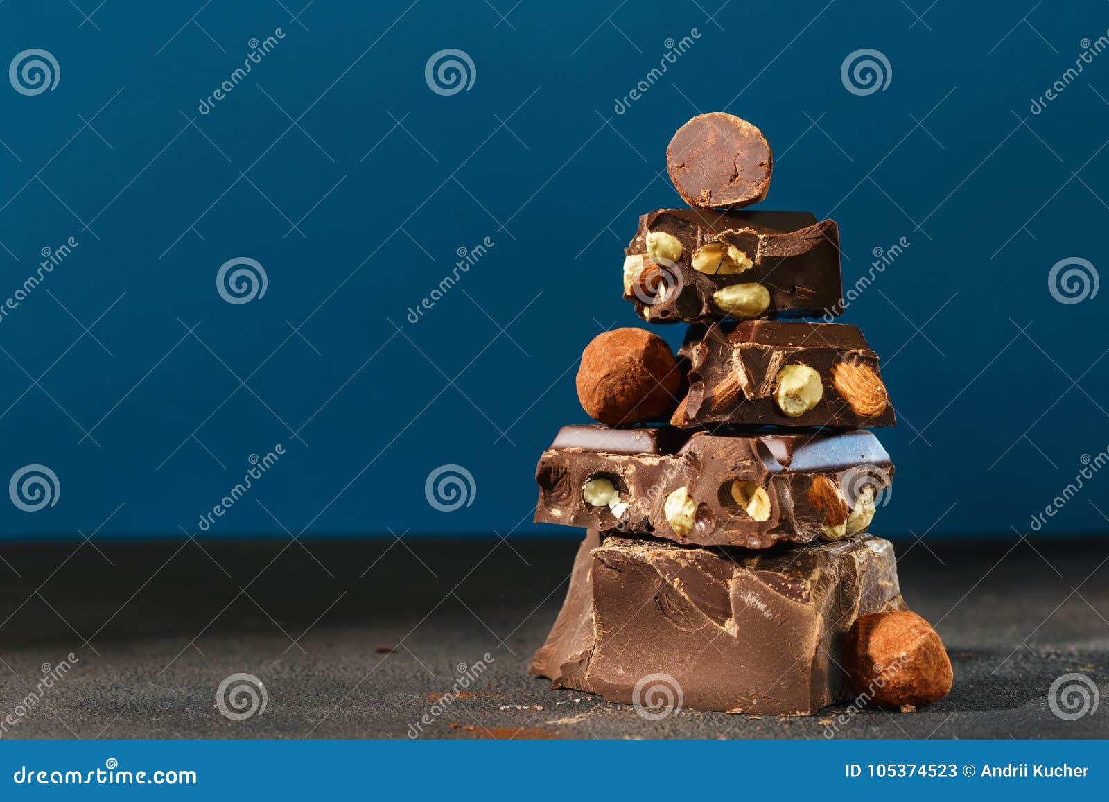 Dark Chocolate Stack on Blue Background with Copy Space Stock Image ...