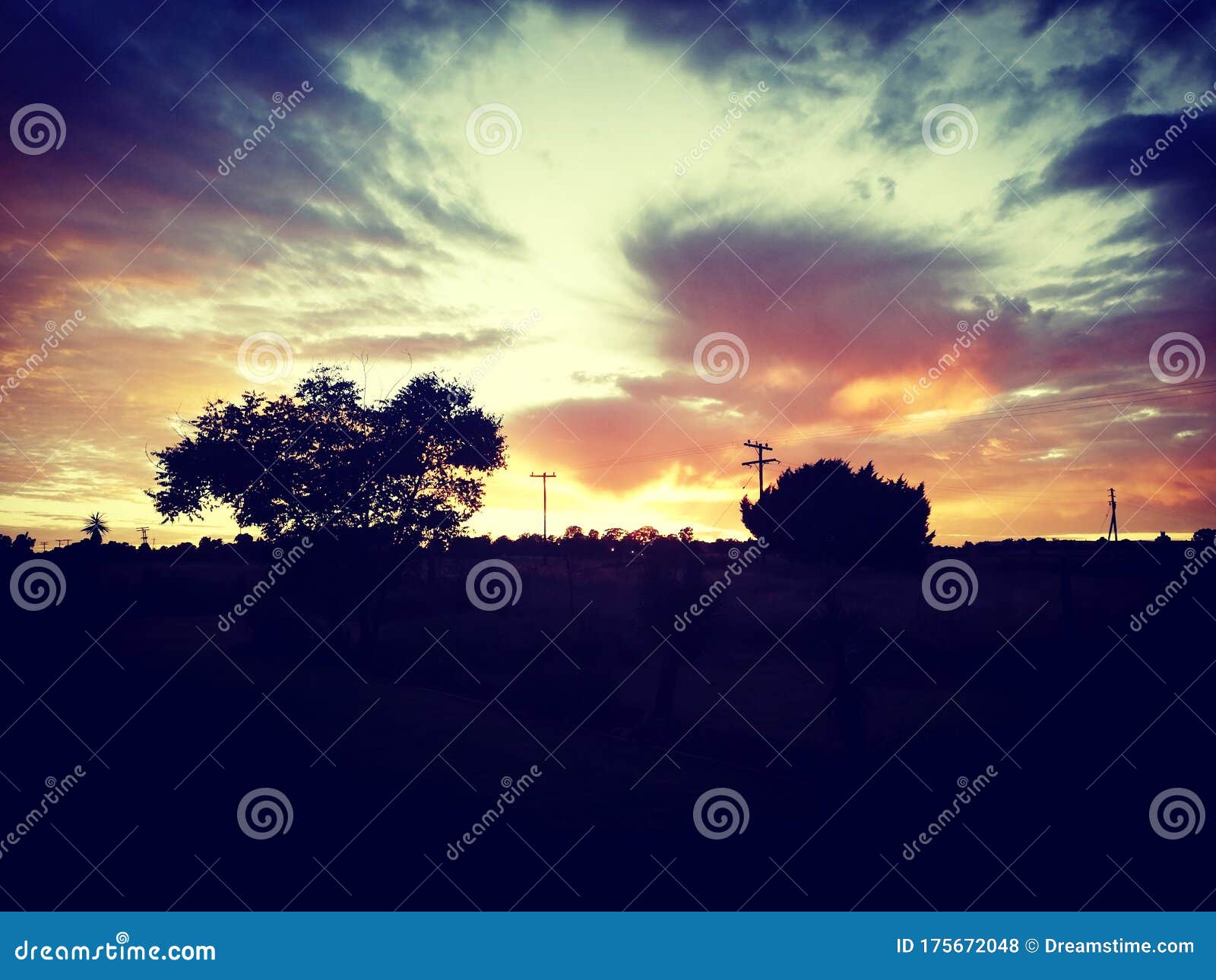 A Heavy Sunset Sky Over The Desert Mountain Ranges Stock Image ...