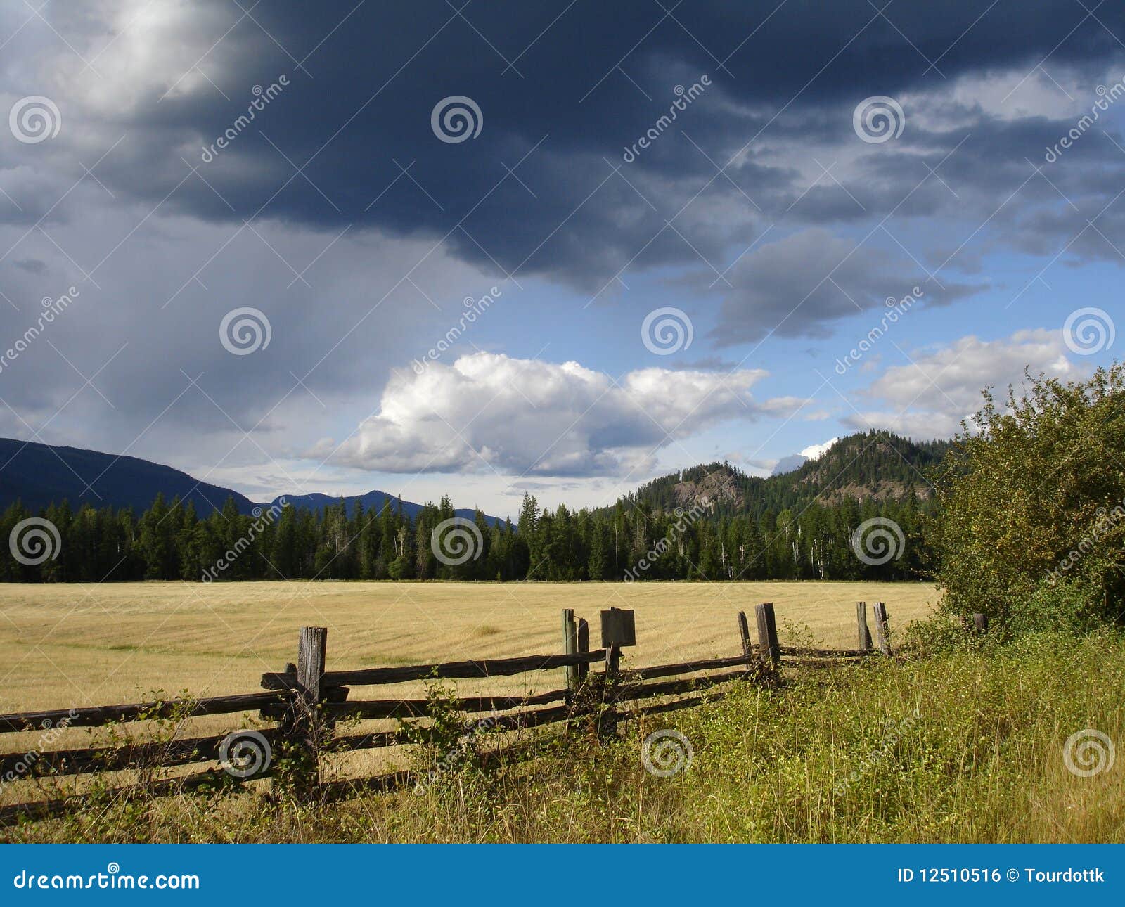 Dark Clouds Canadian Landscape Stock Photo - Image of mountain, blue ...